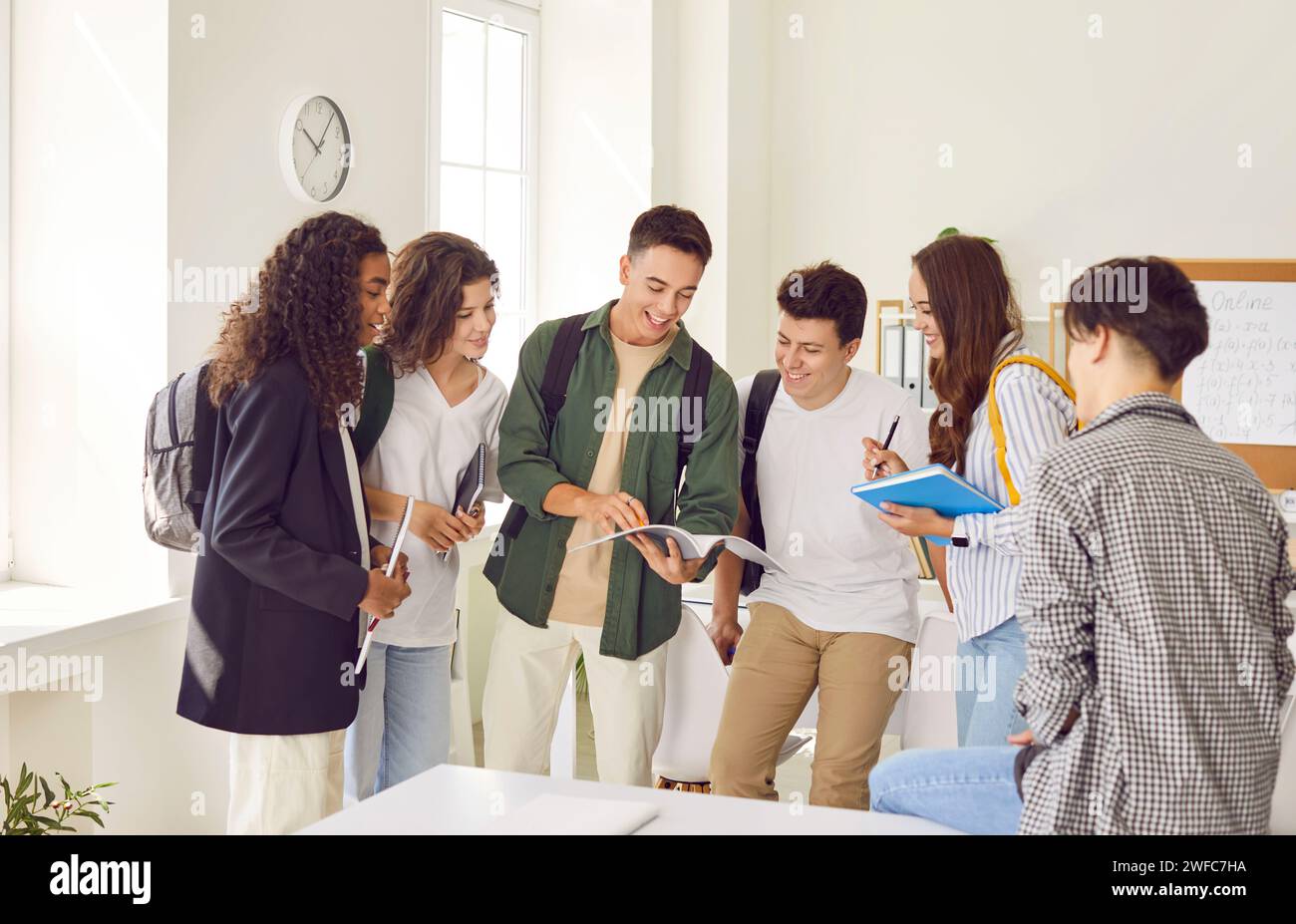 Diverse Group of Teenage Students Communication in Classroom Stock ...