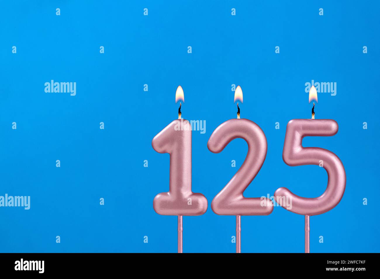 Birthday card with number 125 - Burning anniversary candle on blue ...