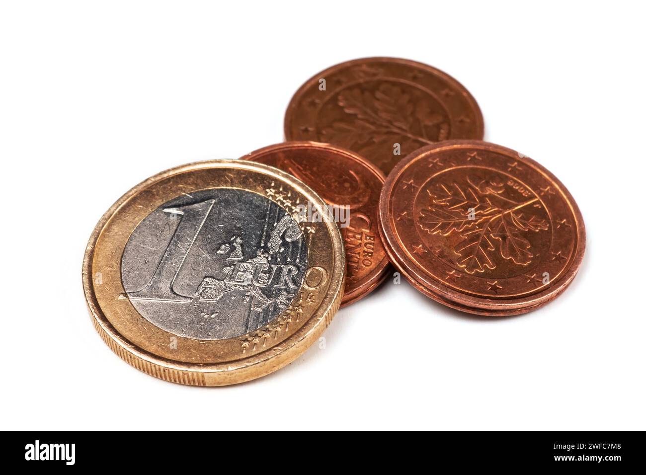 One Euro coin on white background, with many coins Stock Photo - Alamy