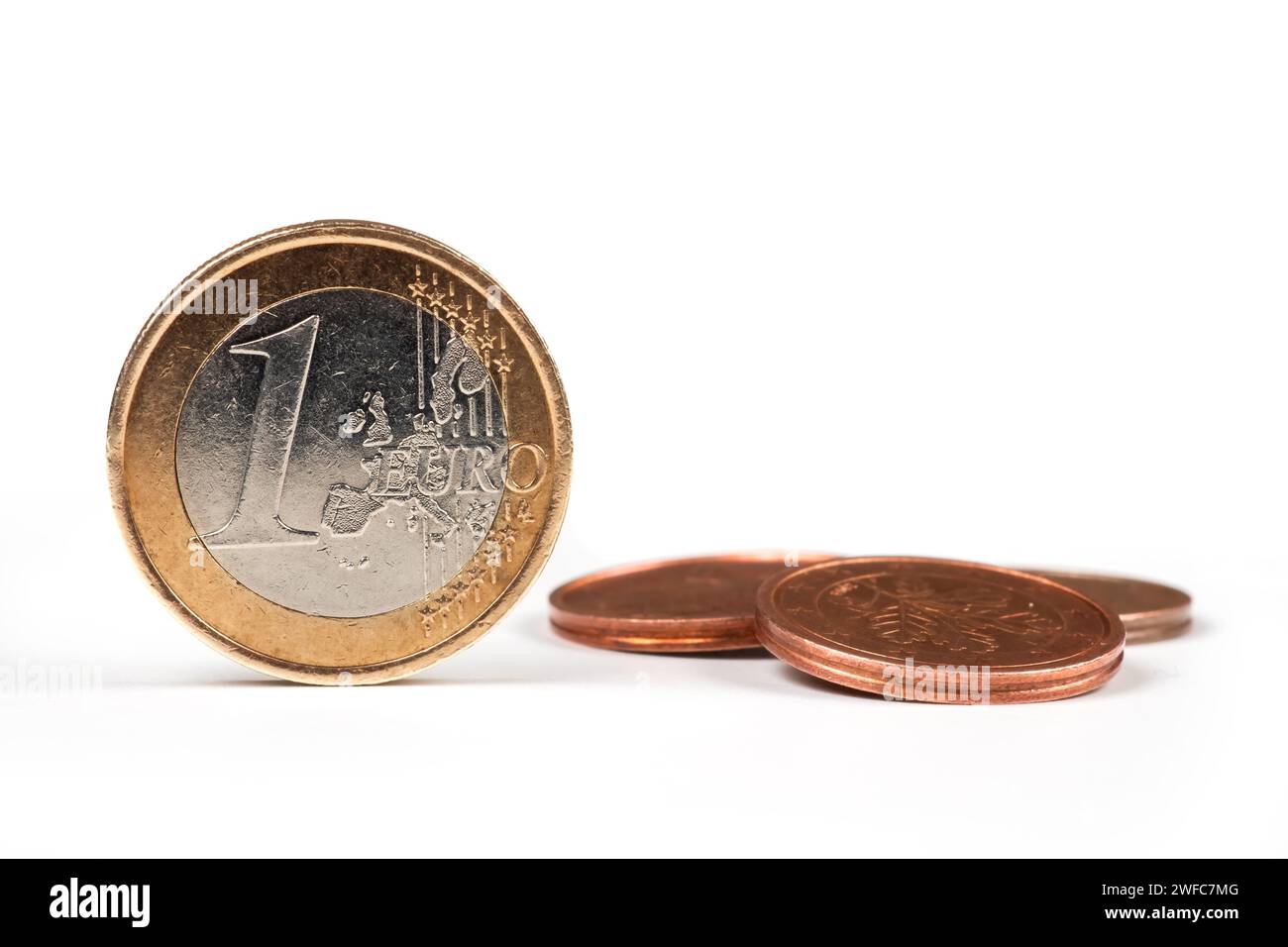 One Euro coin on white background, with many coins Stock Photo - Alamy