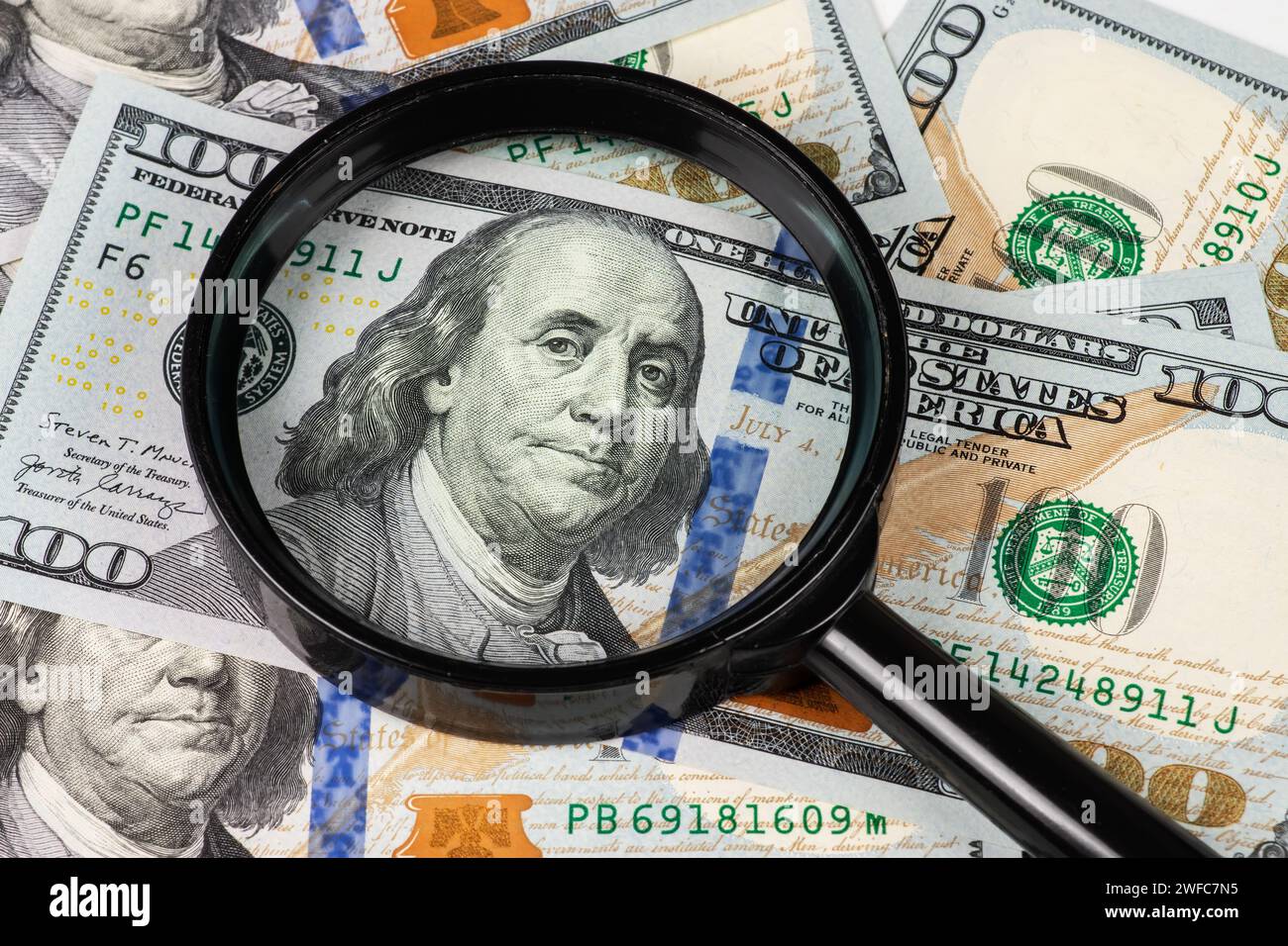 Dollar banknote under magnifying hi-res stock photography and images ...