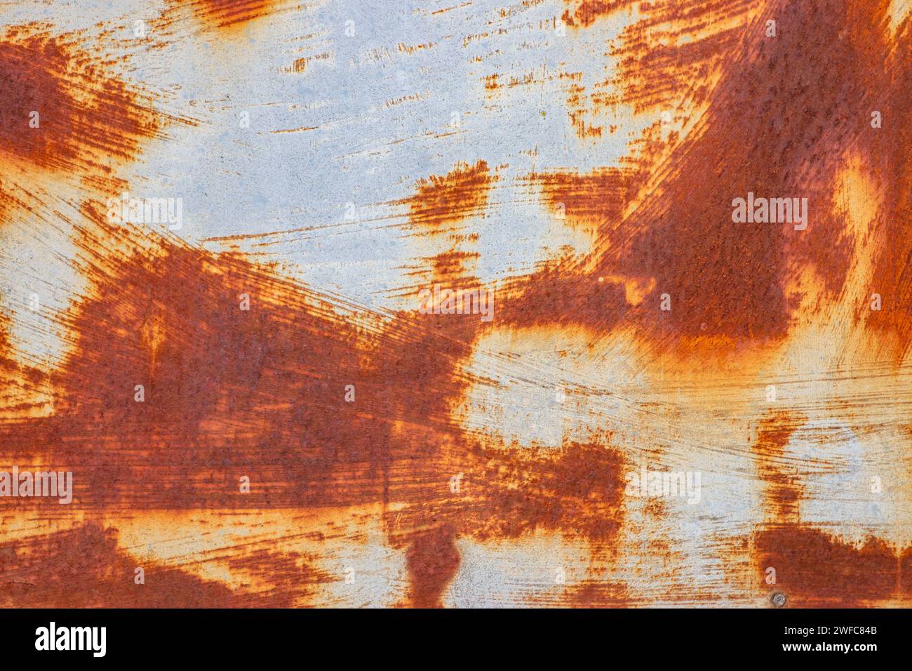 Rusted white painted metal wall. Rusty metal background with streaks of ...