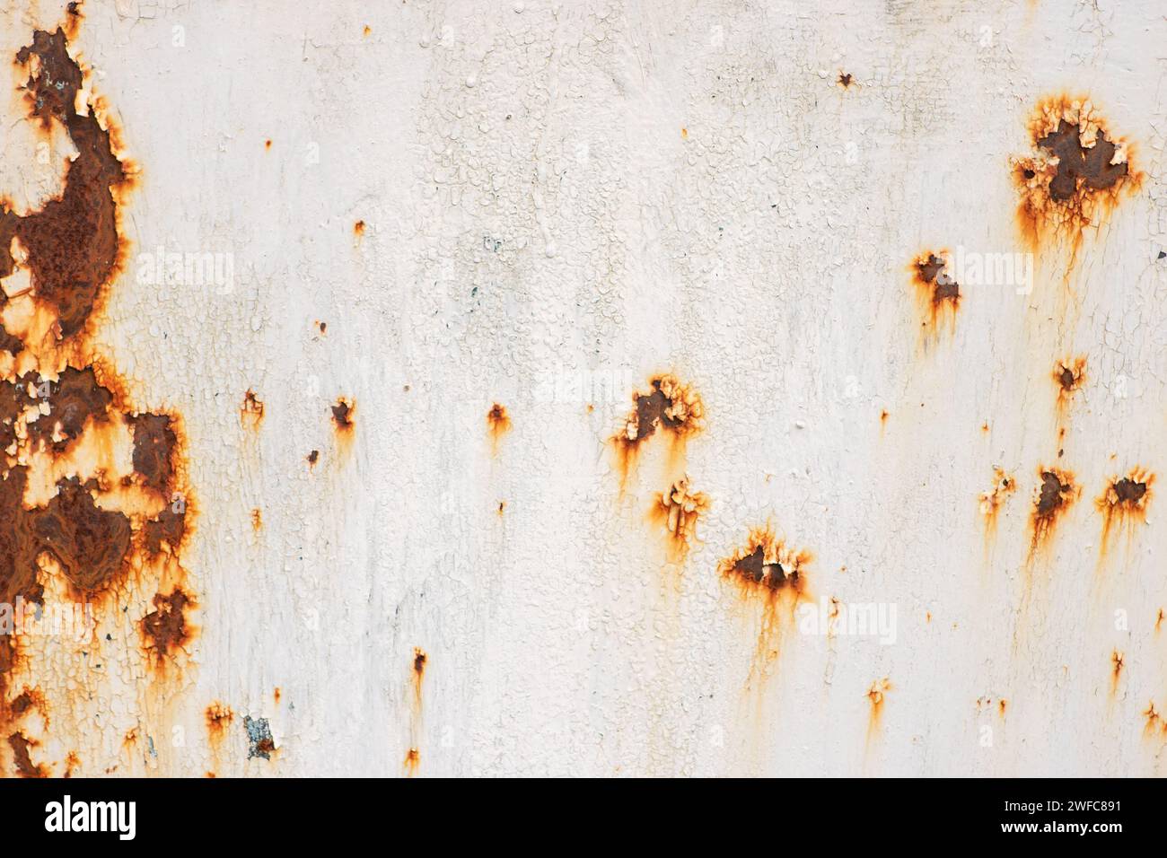 Rusted white painted metal wall. Rusty metal background with streaks of ...