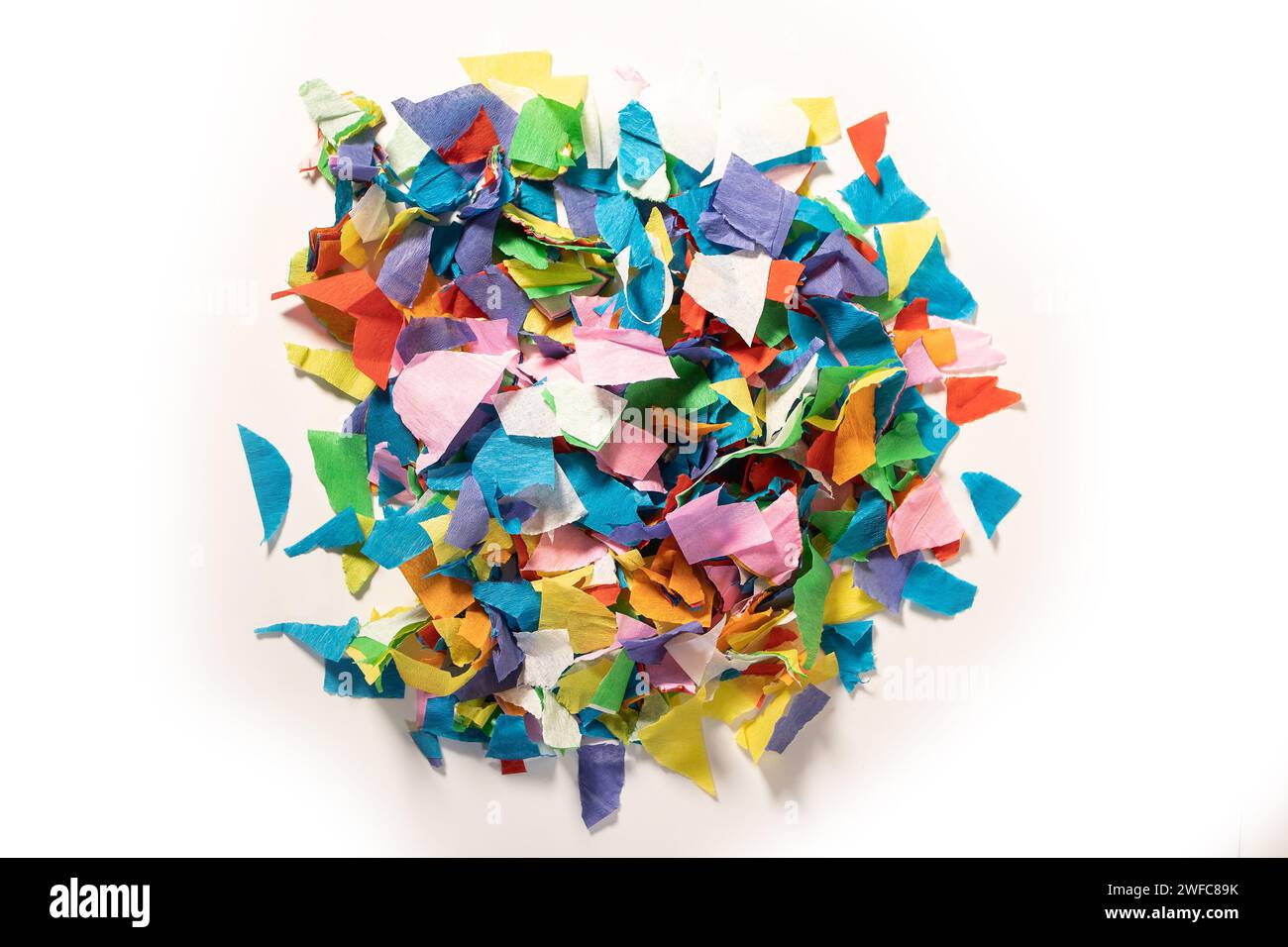 pile of small confetti on white background Stock Photo - Alamy