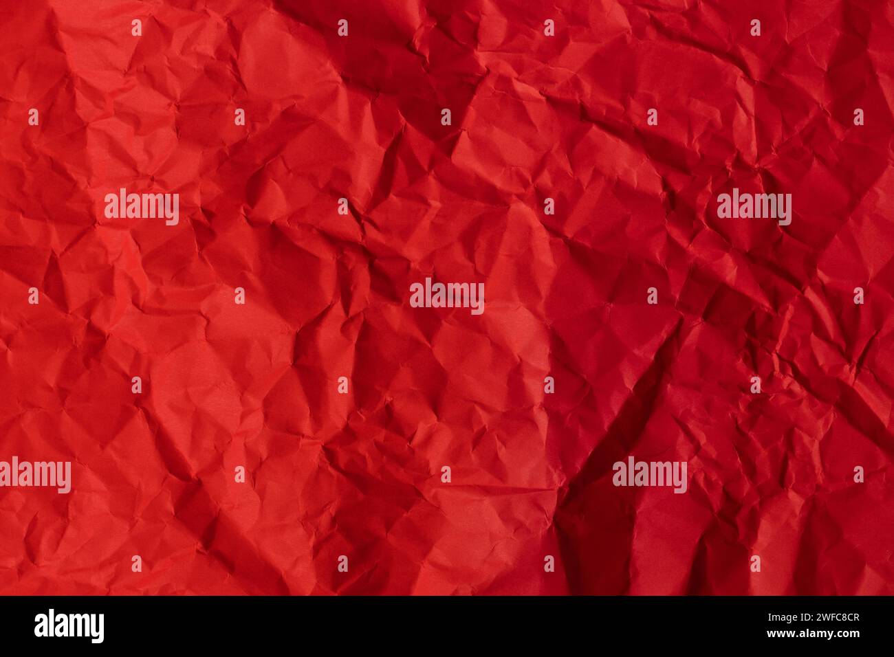 Red crumpled paper texture background Stock Photo - Alamy