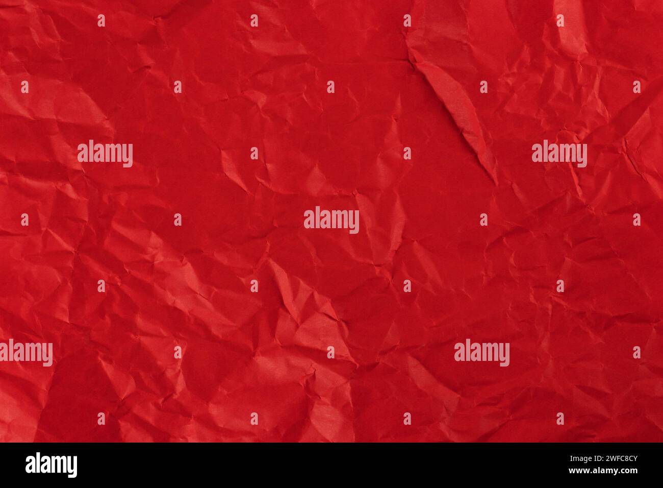 Red crumpled paper texture background Stock Photo - Alamy