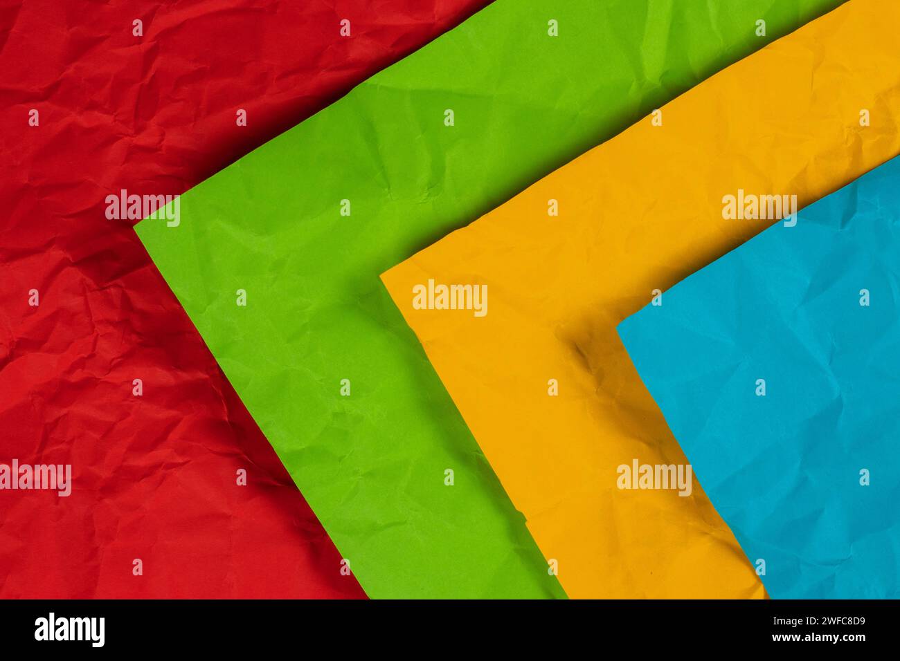 Colorful crumpled paper texture background Stock Photo - Alamy