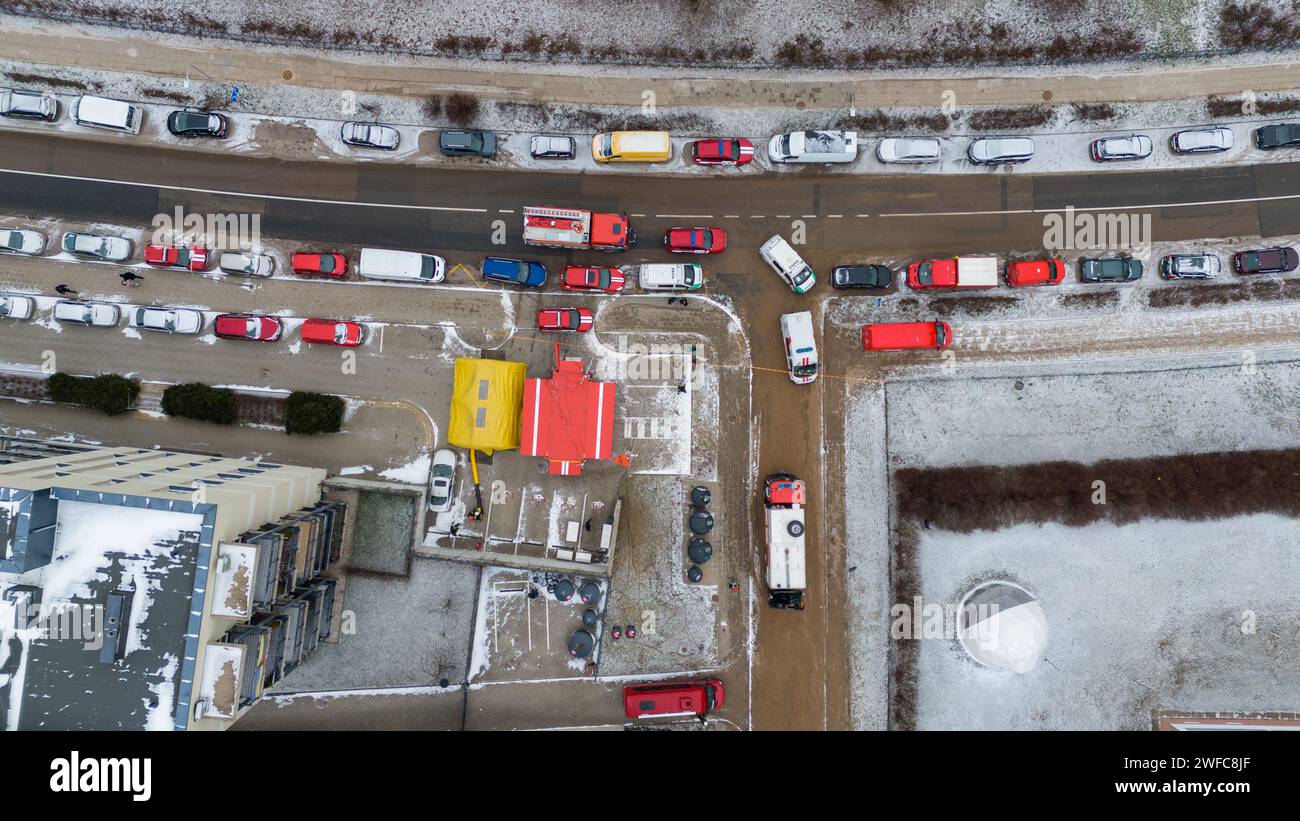 Drone photography of emergency service checkpoint near a burned ...