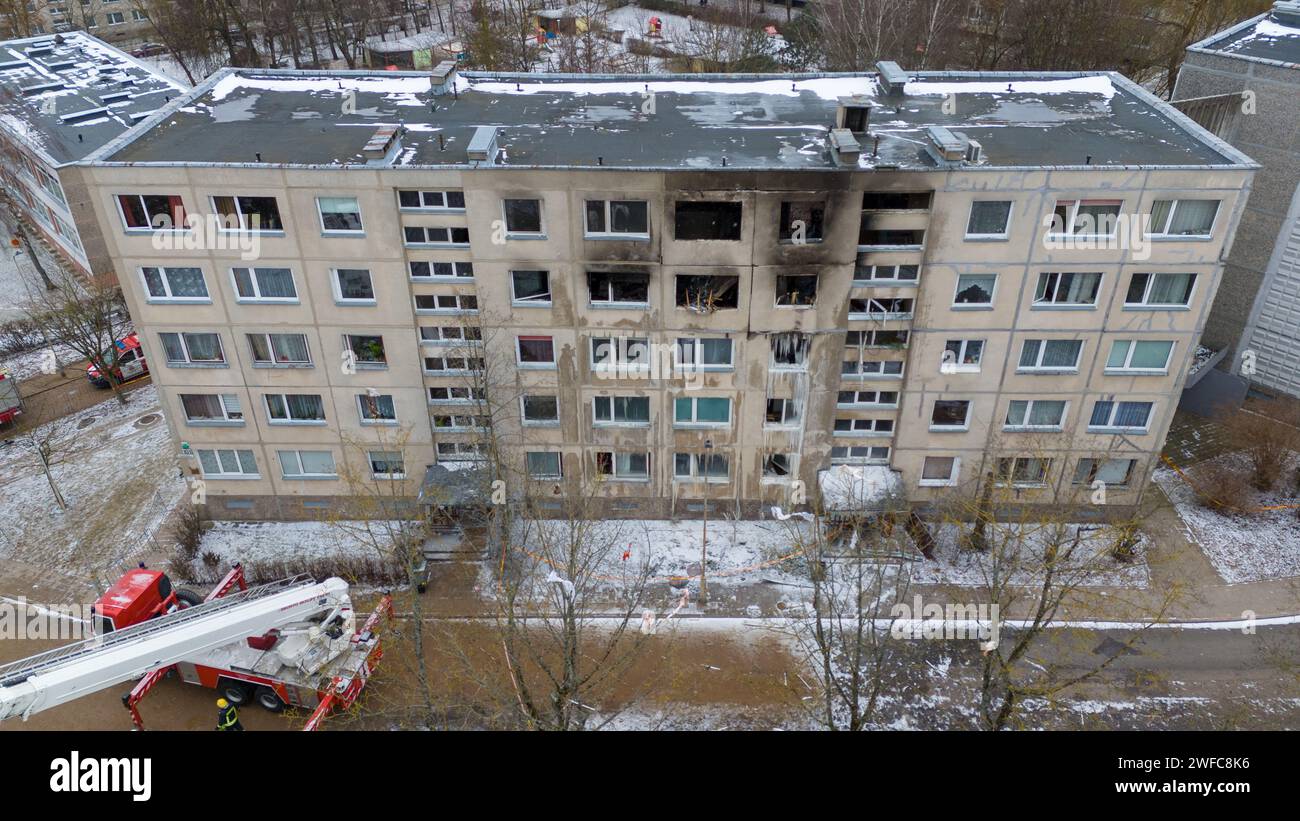 Drone photography of aftermath multistory residential building fire and ...