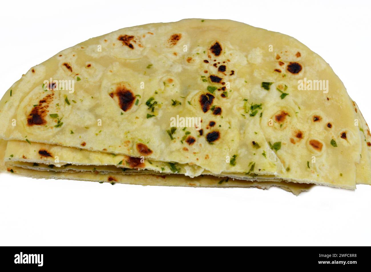 Indian naan bread baked inside a very hot clay tandoor oven, delicious ...