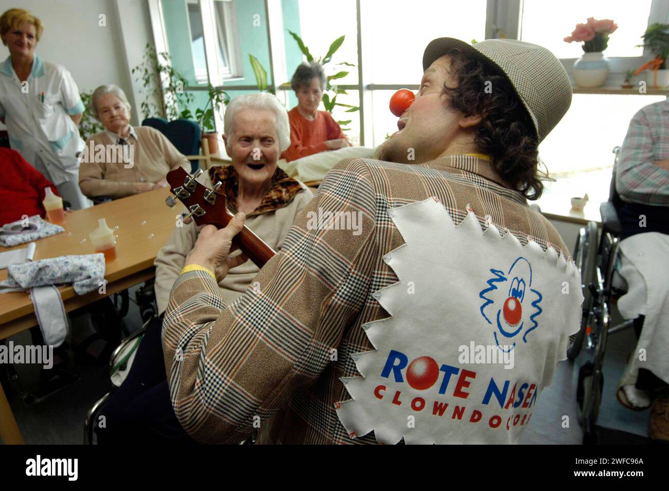 red nose as symbol for clowndoctor, laughter as medicine and therapy ...