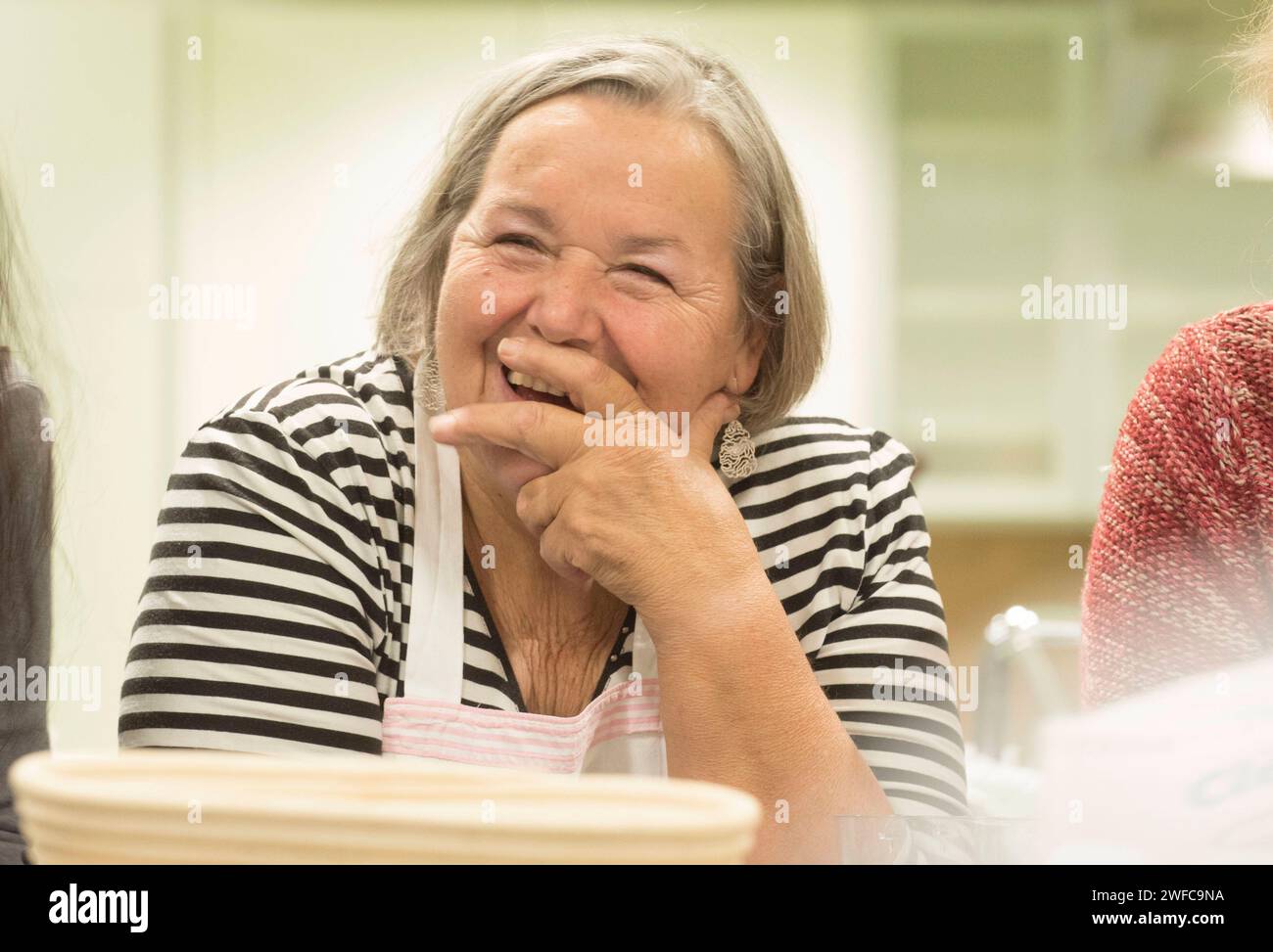 an old person enjoying herself, joy and laughing in old age joy and ...