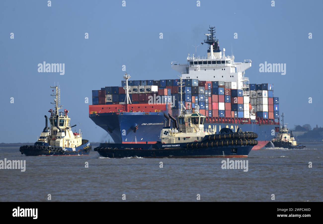 Buffeted by 20mph winds Svitzer tugs bring container ship CMA CGM ...