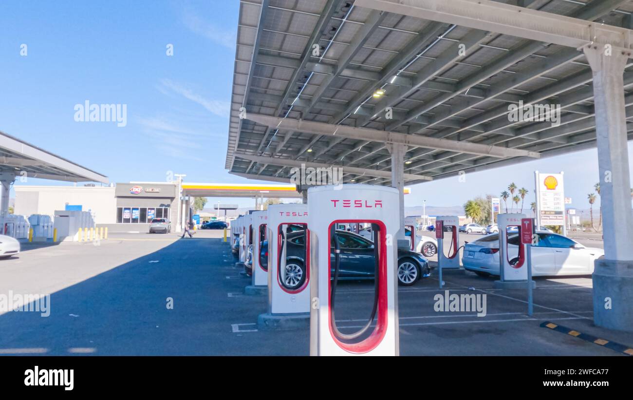 Daytime Tesla Charging, Supercharging Station Power-Up Stock Photo - Alamy