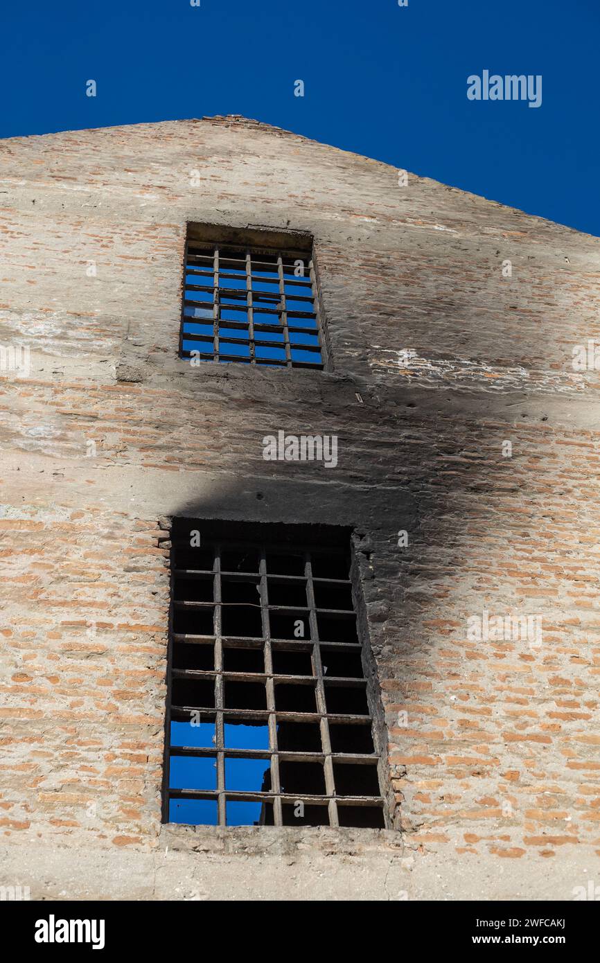burned building exterior with soot stain on window Stock Photo - Alamy