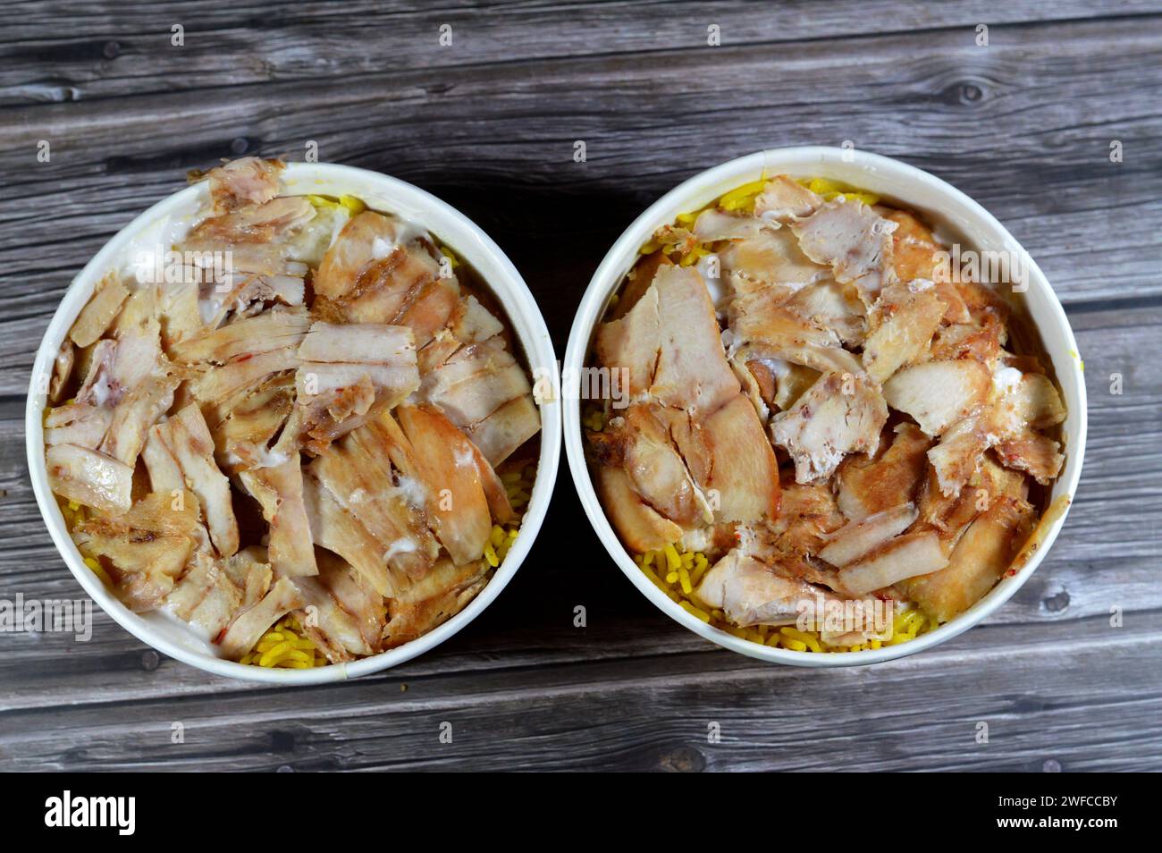 Pieces of Chicken shawarma with yellow Basmati rice, Syrian bread and ...