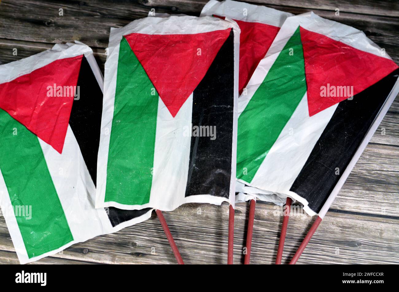 The flag of Palestine, a tricolor of three equal horizontal stripes ...