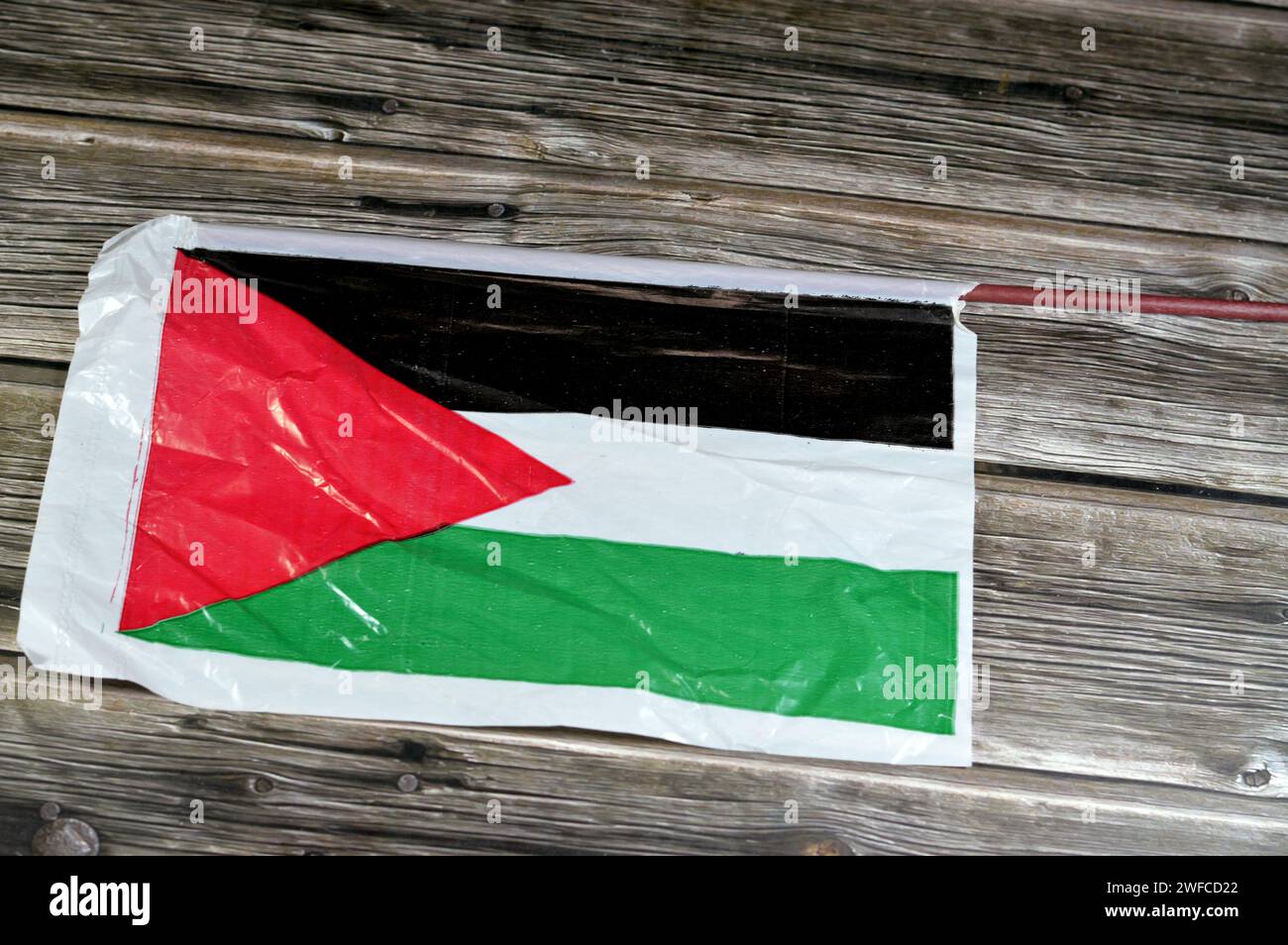 The flag of Palestine, a tricolor of three equal horizontal stripes ...
