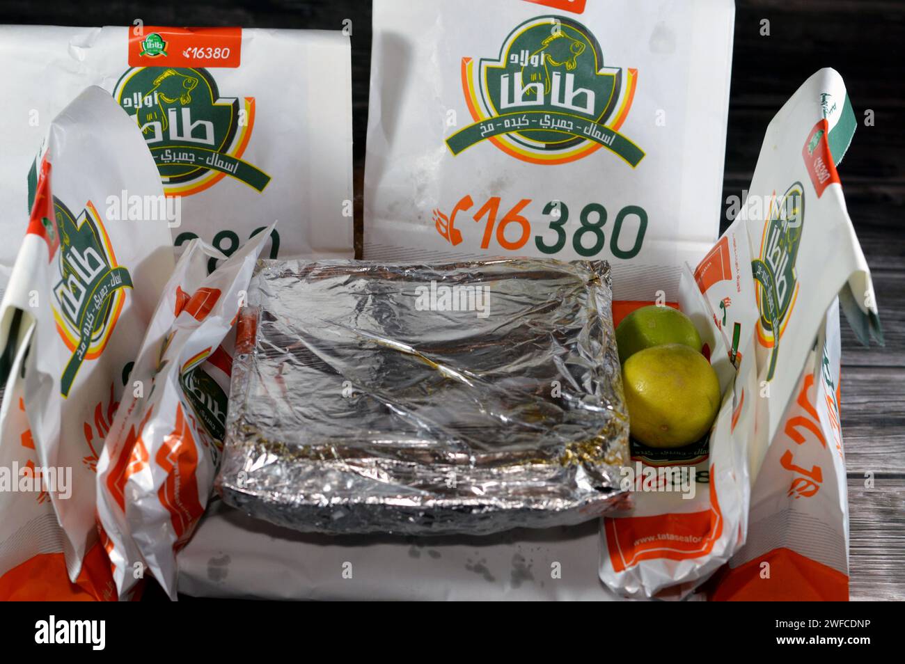 Cairo, Egypt, January 22 2024: Awlad Tata, Tata sons delivery package ...