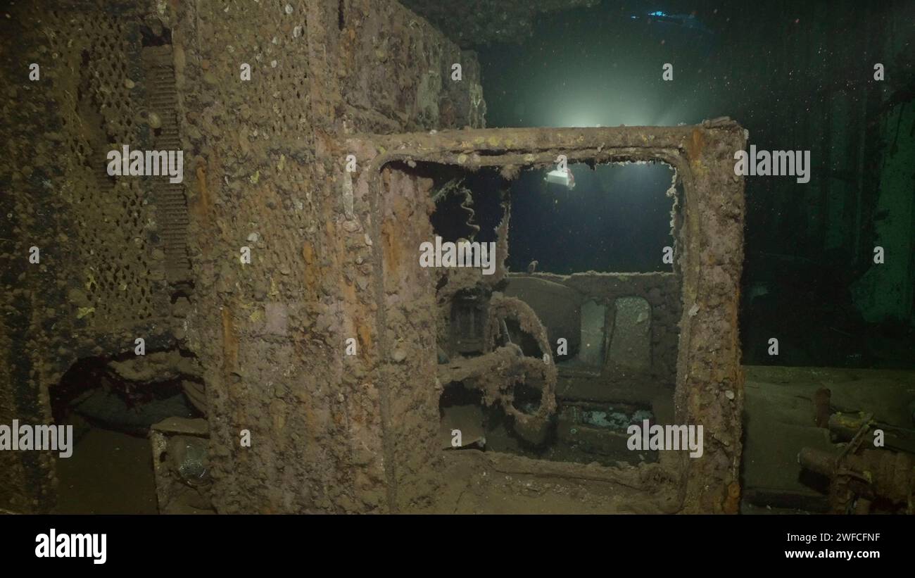 Close-up of truck cab lying on its side inside hold of ferry Salem ...