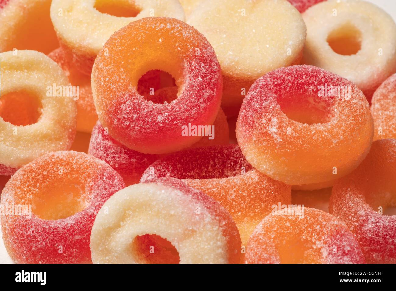 Gummy rings with sugar background. Close up Stock Photo - Alamy