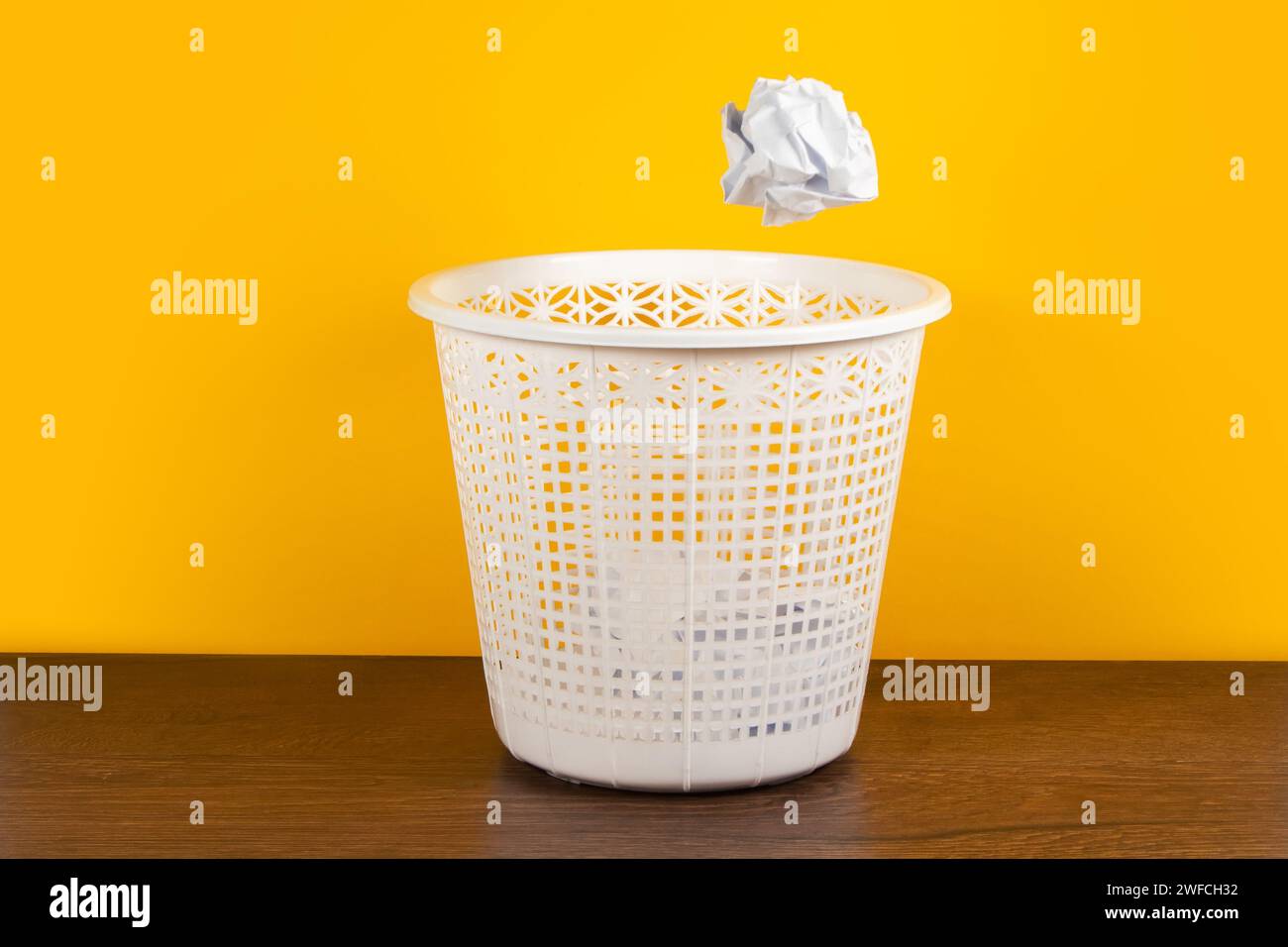 Throw it in the waste paper basket or bin concept for business ...