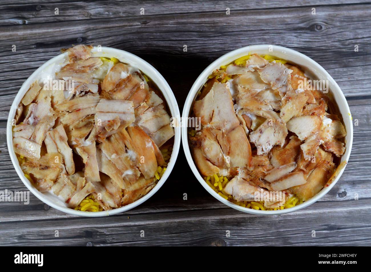 Pieces of Chicken shawarma with yellow Basmati rice, Syrian bread and ...