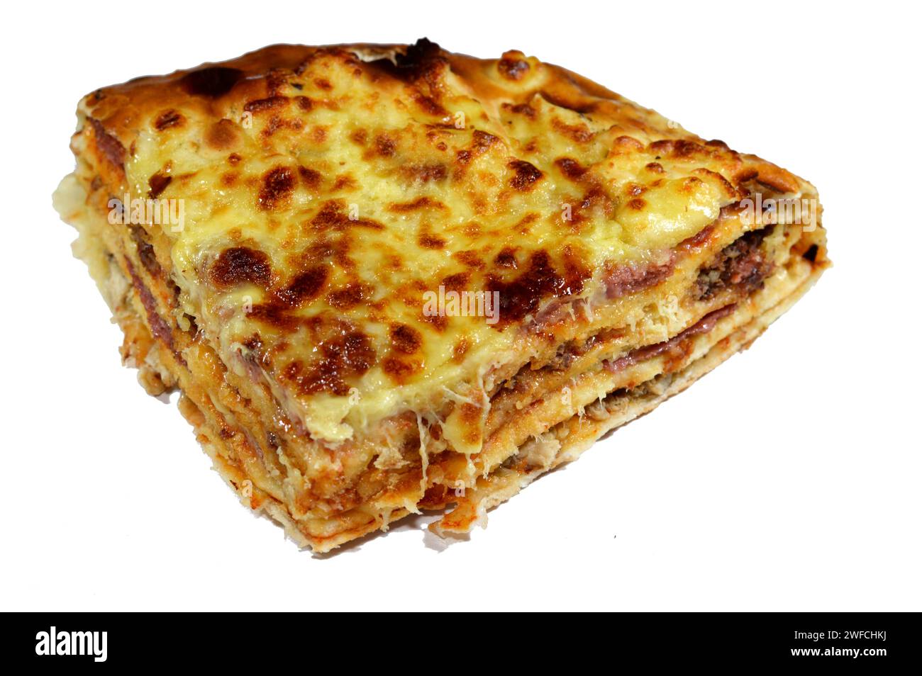 Multi-layers baked pizza cake, consists of layers of salami, barbeque ...