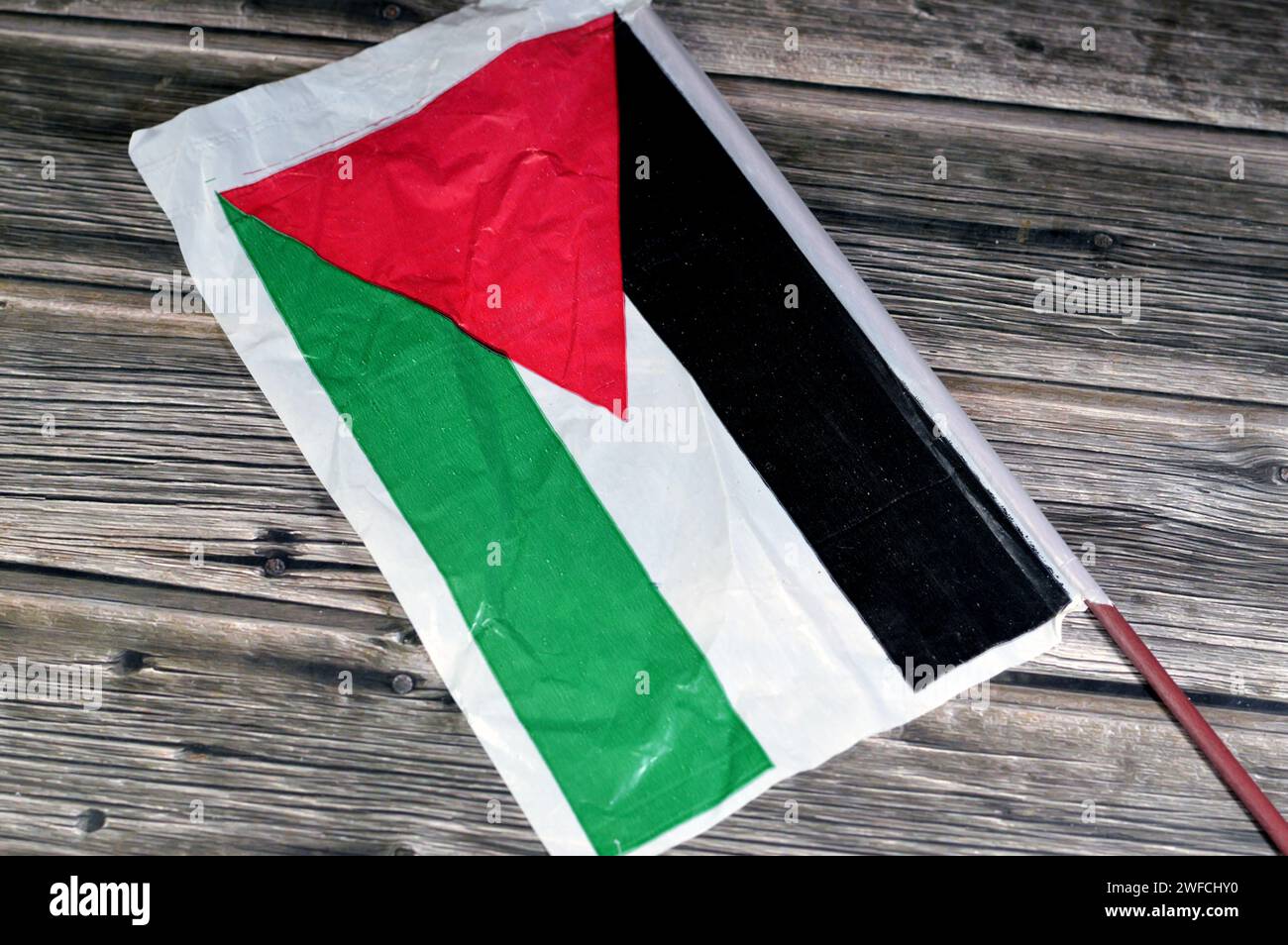 The flag of Palestine, a tricolor of three equal horizontal stripes ...