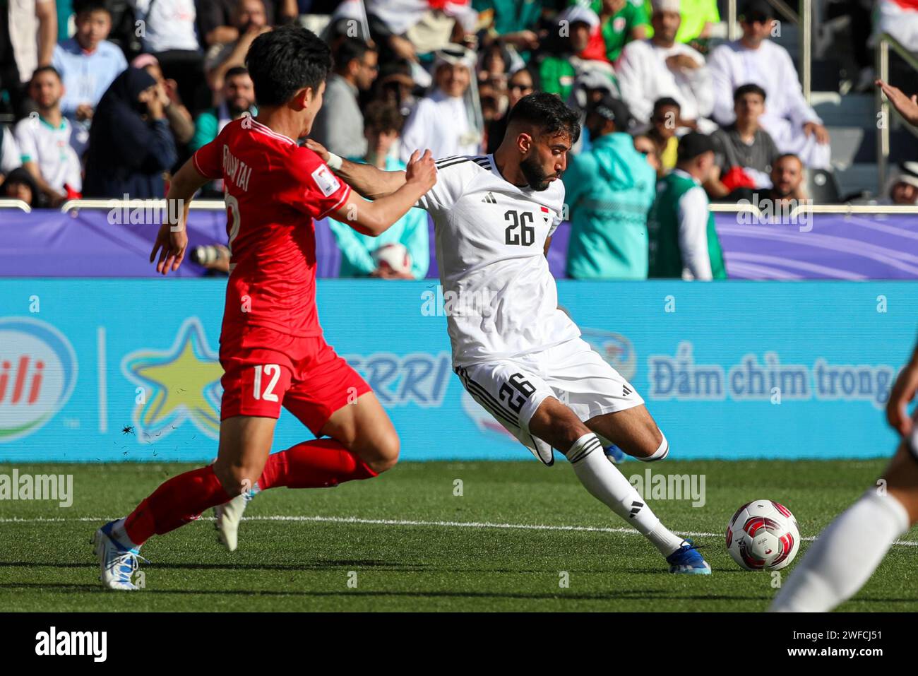 Doha, Qatar. 24th Jan, 2024. Montader Madjed of Iraq and Tuan Tai Phan ...
