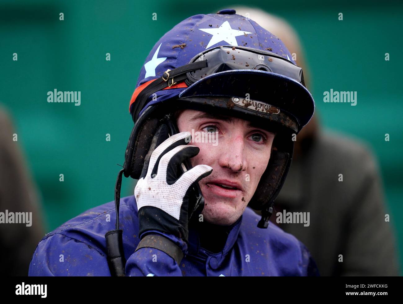 Jockey Lorcan Murtagh makes a phone call after competing in the Hozier ...