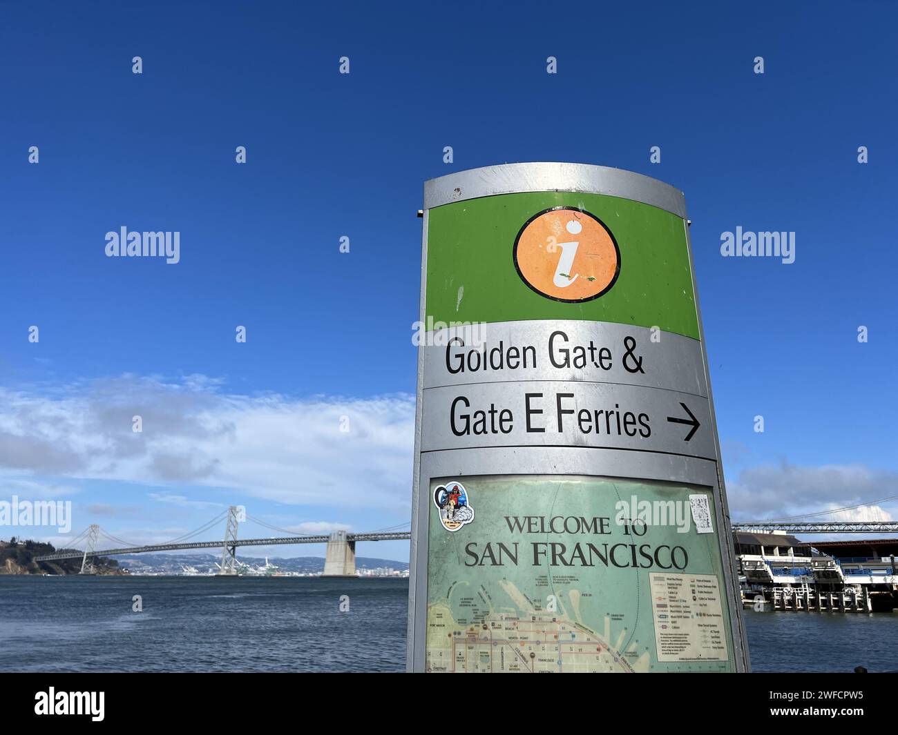 Informational sign for Golden Gate & Gate E Ferries with the Bay Bridge ...