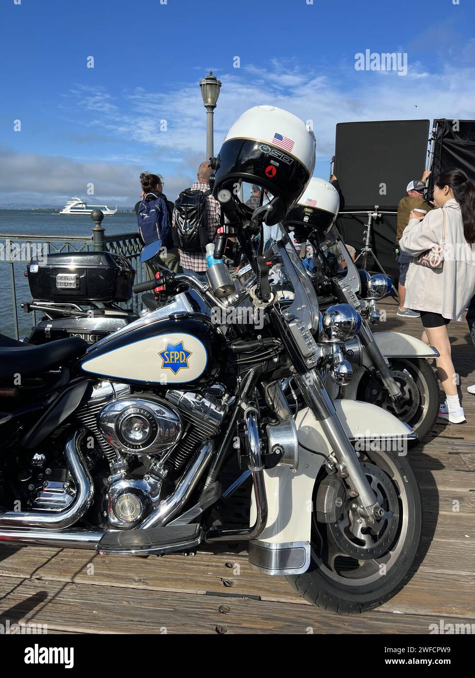San Francisco Police Department motorcycle parked at Pier 7, with a ...