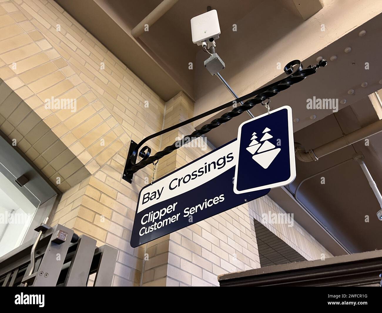 Bay Crossings Clipper Customer Services sign hanging inside a transit ...