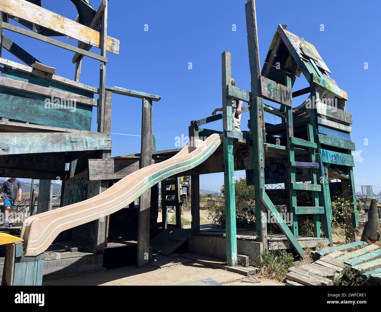 Children playing at the unique and colorful structures of Adventure ...