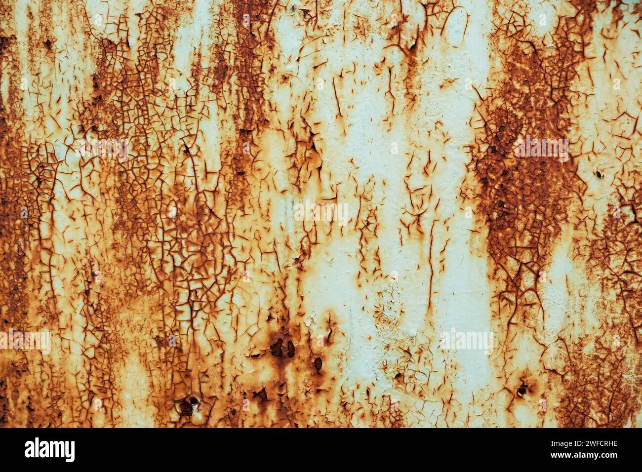 Rusted white painted metal wall. Rusty metal background with streaks of ...