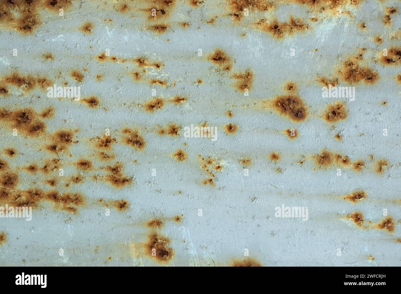 Rusted white painted metal wall. Rusty metal background with streaks of ...