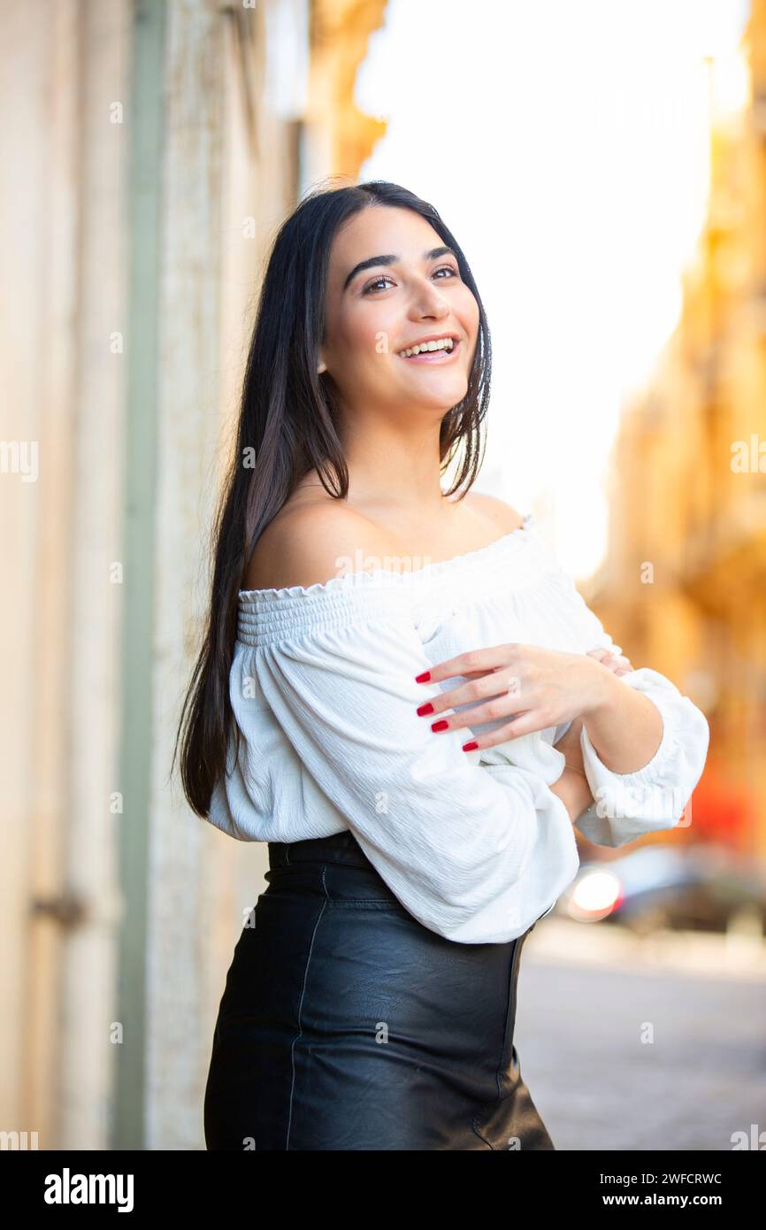 Happy young woman outdoors hi-res stock photography and images - Alamy