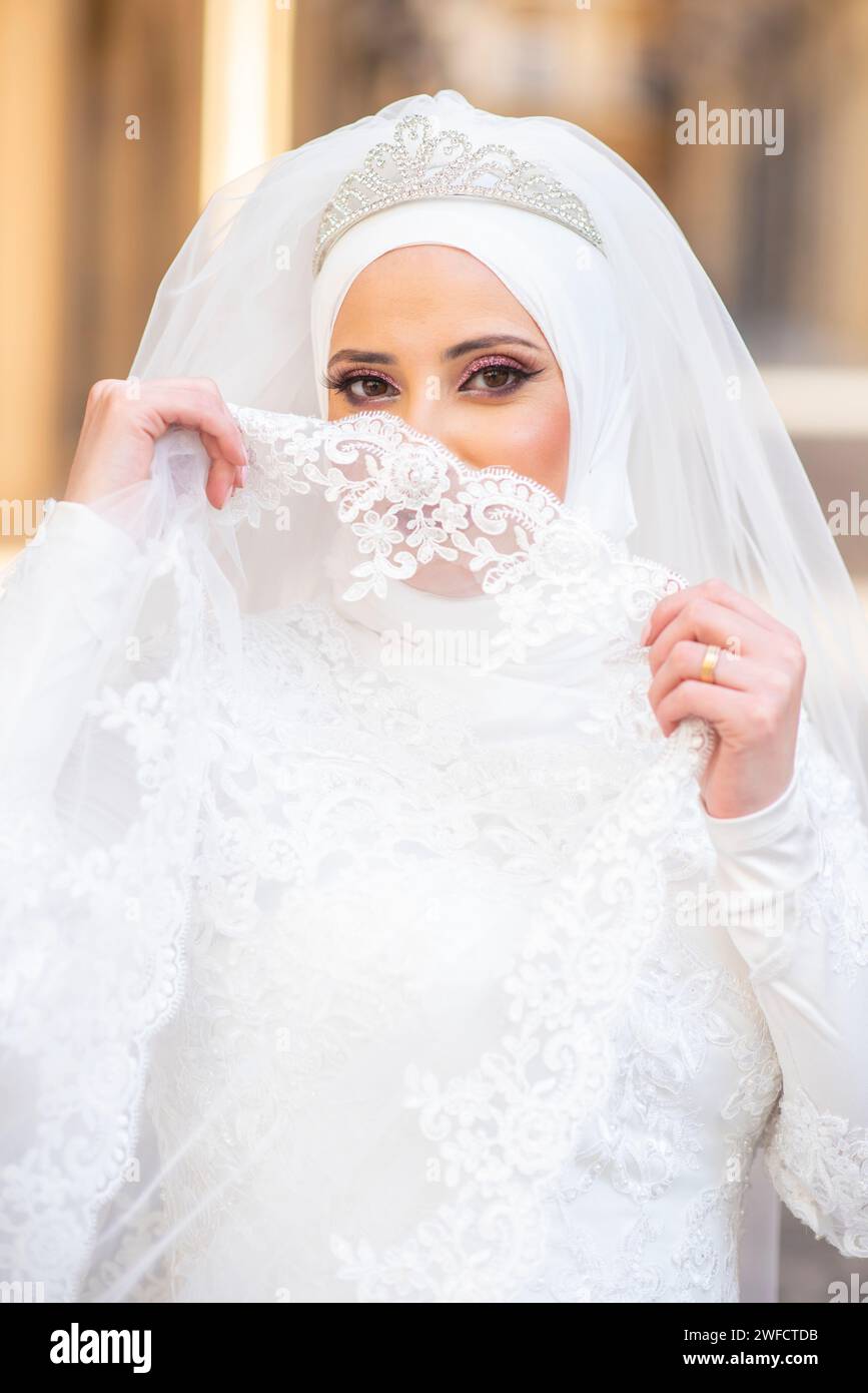 Beautiful Muslim bride outdoors Stock Photo - Alamy