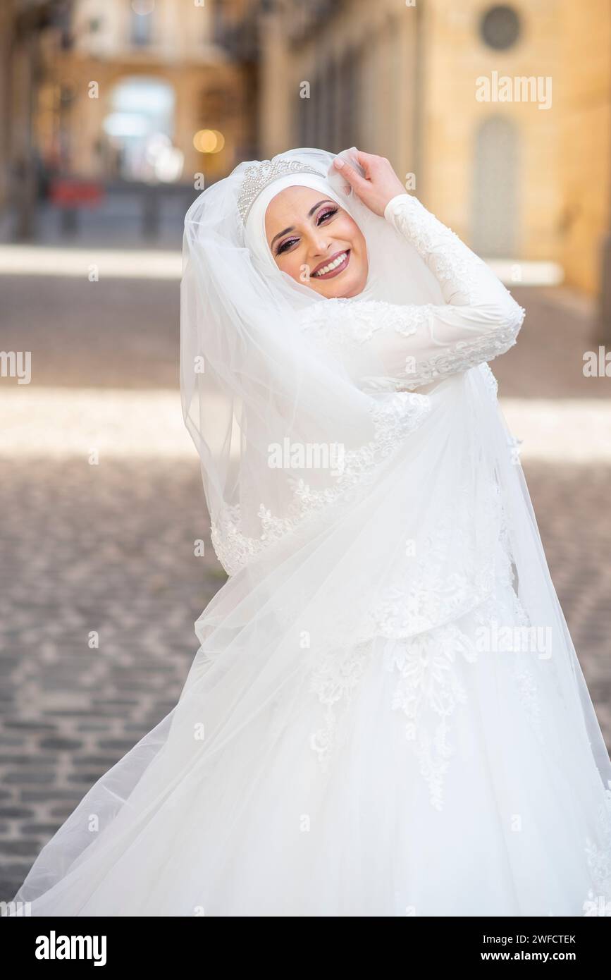 Beautiful Muslim bride outdoors Stock Photo - Alamy