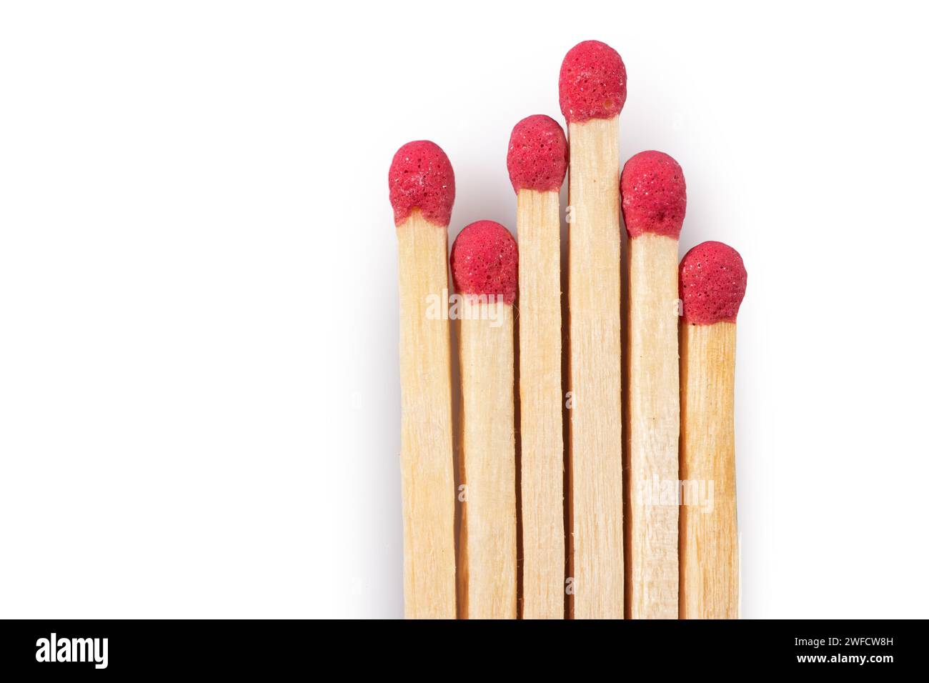 Red matches on white background close up Stock Photo - Alamy