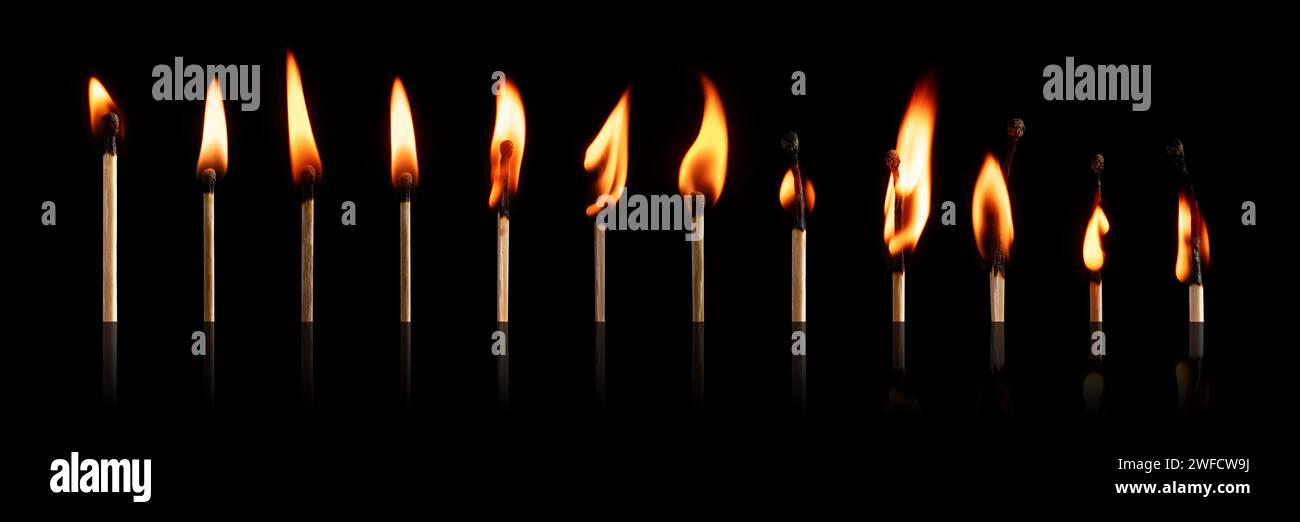 The stages of match burning on a black background. Safe match with red ...