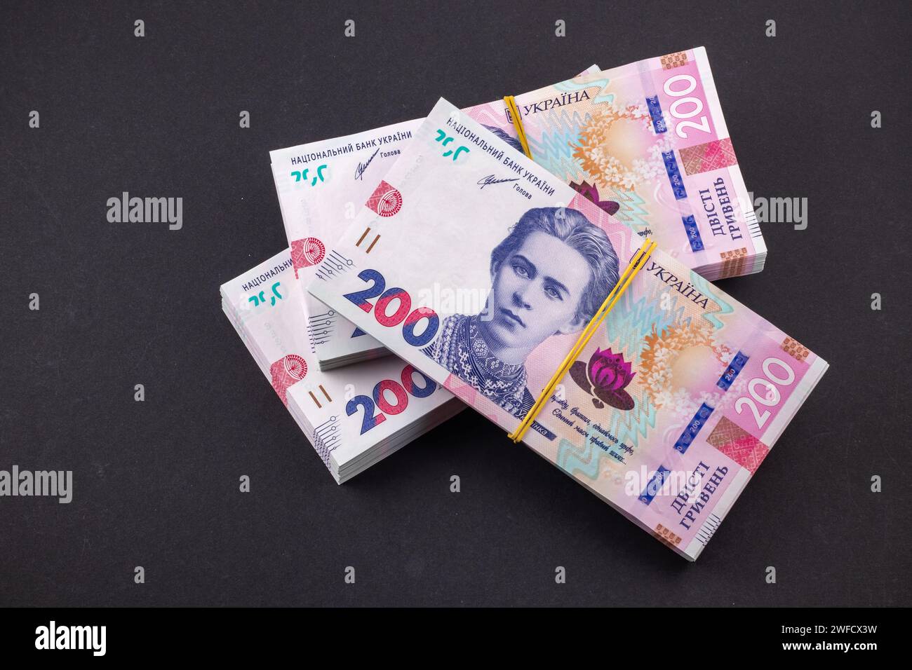 Stack of ukrainian money hryvnia. grivna, hryvna with 200 banknotes ...