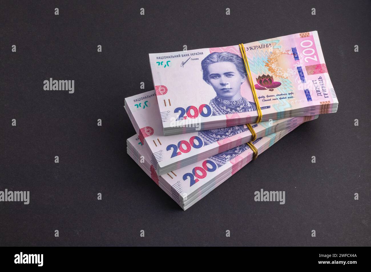 Stack of ukrainian money hryvnia. grivna, hryvna with 200 banknotes ...
