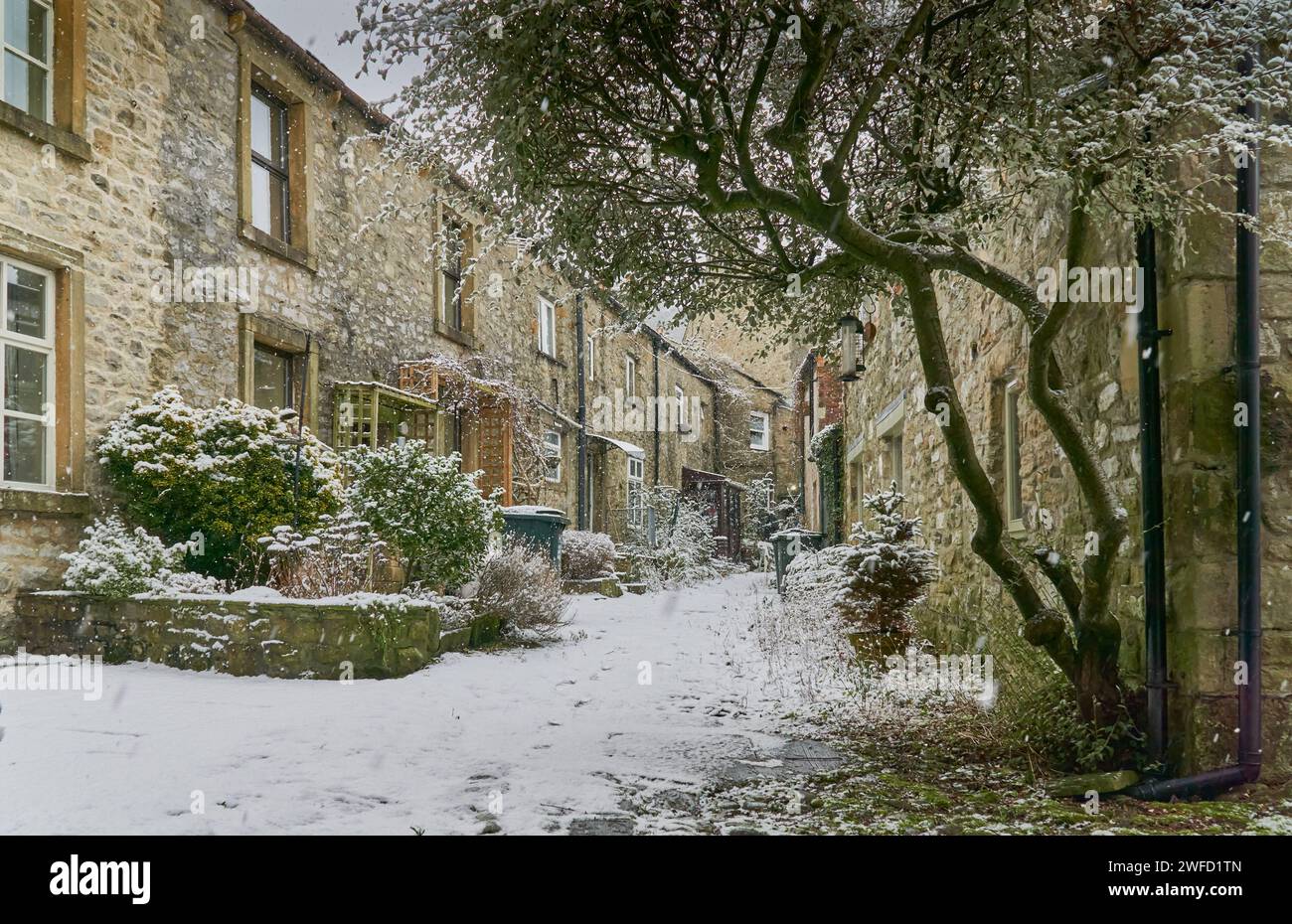 Winter street scene in Settle North Yorkshire with snow Stock Photo - Alamy