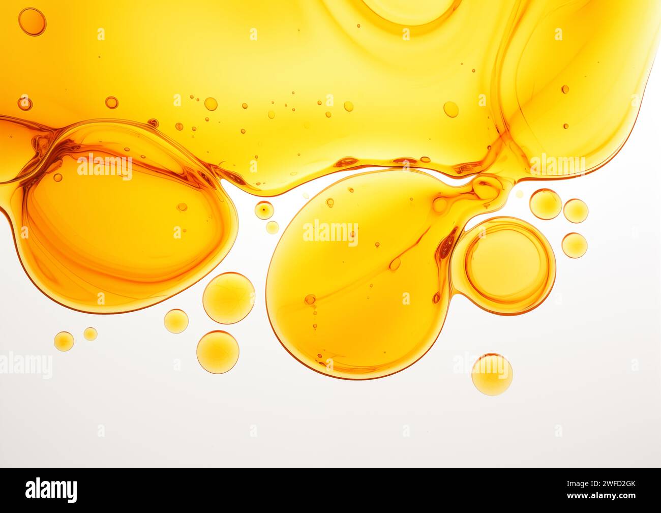 yellow orange honey oil lubricant fluid on white background Stock Photo ...