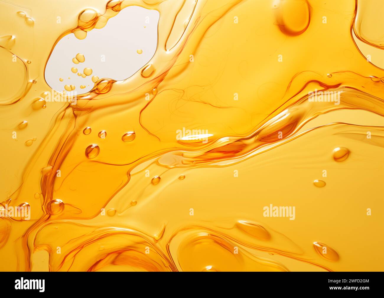yellow orange honey oil lubricant fluid on white background Stock Photo ...