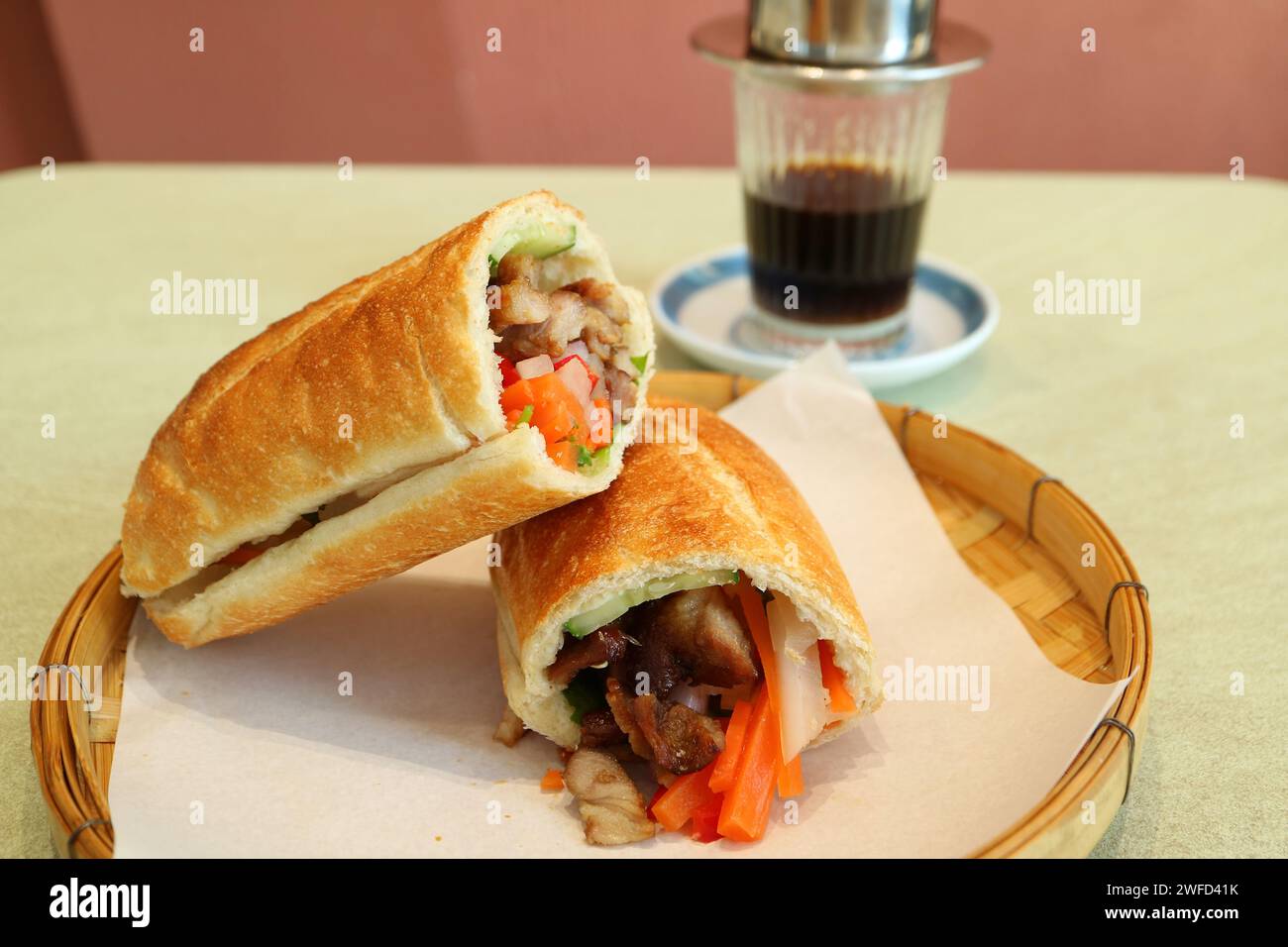 Mouthwatering Banh Mi with Vietnamese Drip Coffee in the Backdrop Stock Photo - Alamy