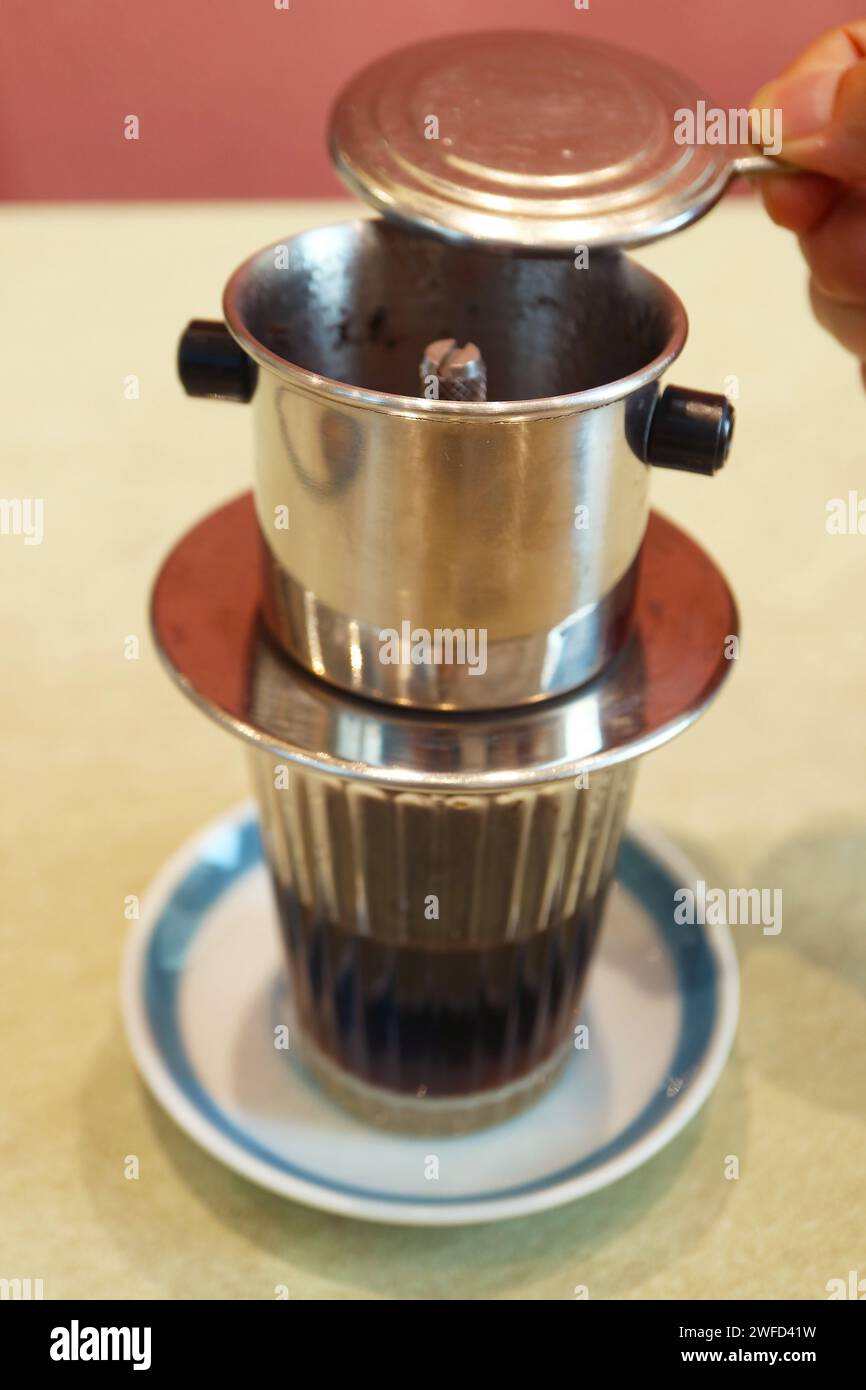 Closeup of People Brewing Vietnamese Drip Coffee Stock Photo - Alamy