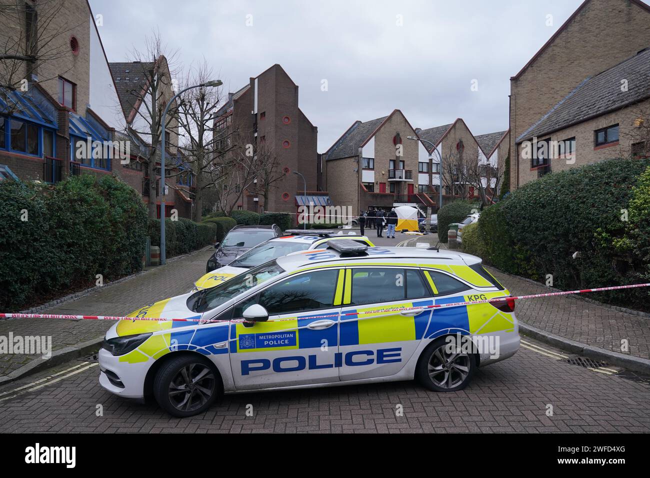 Police officers at the scene near Bywater Place in Surrey Quays, south ...